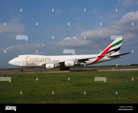The Oo Thd Emirates Boeing 747 4hafer Is Taxiing At An Airport On