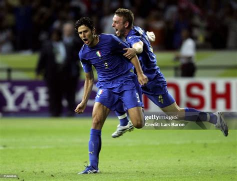 Fabio Grosso Of Italy Celebrates Scoring The Winning Penalty In A