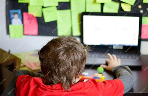 Premium Photo Rear View Of First Grade Boy At Home