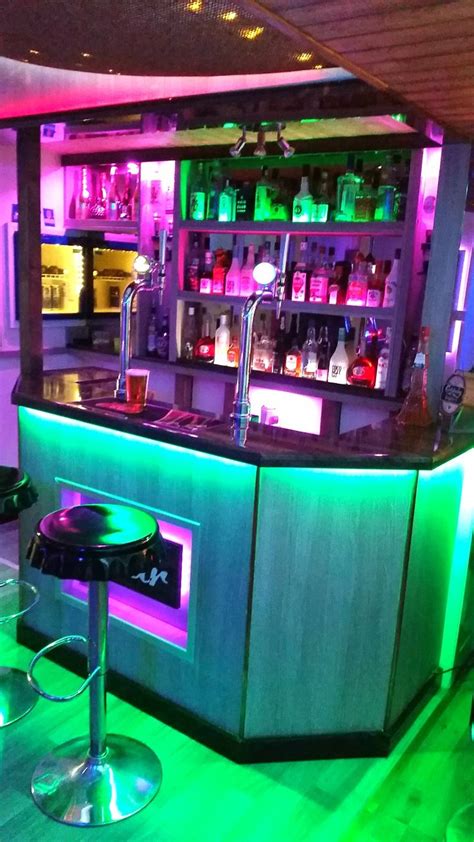Home Bar With Neon Lights And Stools