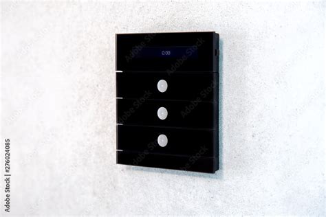 Multi Function Light Switch For Controlling Functions Of A Smart Home With Three Buttons And A