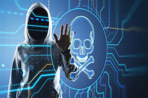 Premium Photo Hacker In Hoodie Using Digital Skull Hologram On Blurry