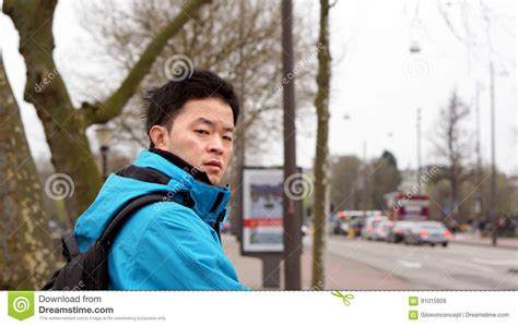 Tired Jet Lag Asian Man After Traveling To Europe Stock Photo Image