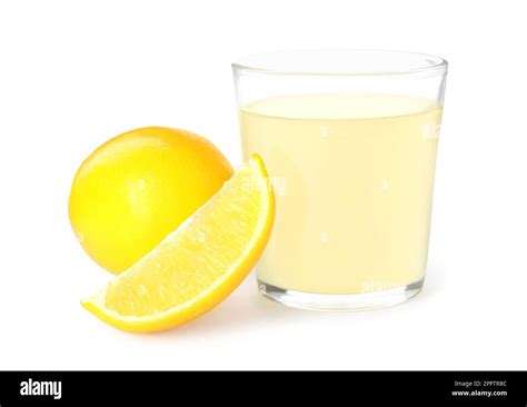 Freshly squeezed juice and lemons on white background Stock Photo - Alamy