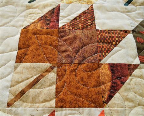 Falling Leaves Is A Patchwork Quilt Depicting A Tree Decked Out In