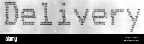 ‘delivery‘ Printed In A Bold Large Font On A Dot Matrix Printer Stock