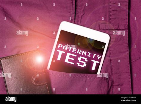 Conceptual Display Paternity Test Word Written On A Test Of DNA To