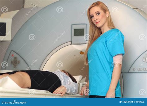 Female Patient Lying On A CT Scan Bed Stock Photo Image