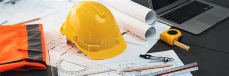 Architectural Designed Blueprint Layout And Engineer Tools On Table