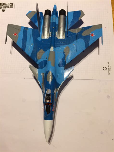 Blue And Silver Fighter Jet