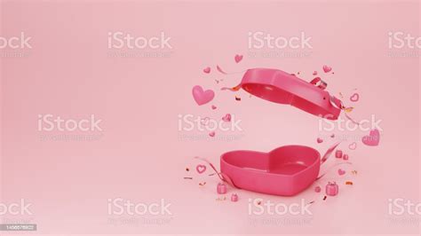 분홍색 배경에 풍선 하트와 색종이가 있는 분홍색 하트 모양의 선물 상자를 엽니다 행복한 발렌타인 데이 결혼식 및 기념일 개념