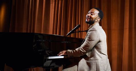 John Legend Shares His First Photo With Newborn Esti