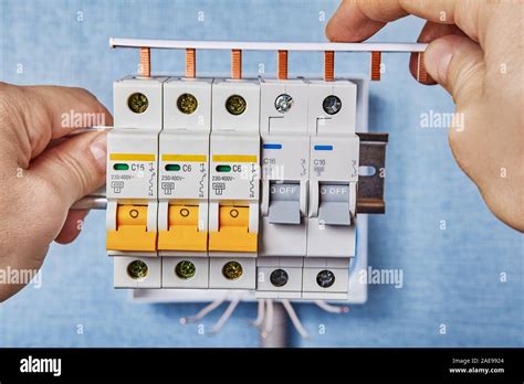 Installing New Consumer Unit With Automatic Fuses Or Circuit Breakers An Electrician Use