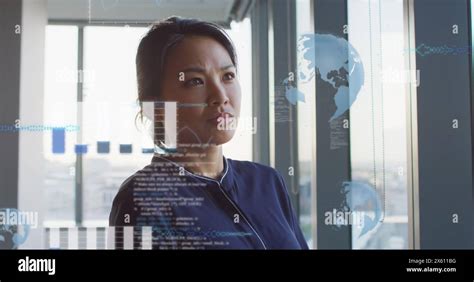 image of graphs globes and computer language over thoughtful asian