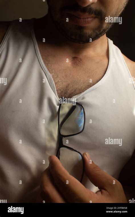 Brazilian Male Hung His Glasses On His White Cloth Stock Photo Alamy