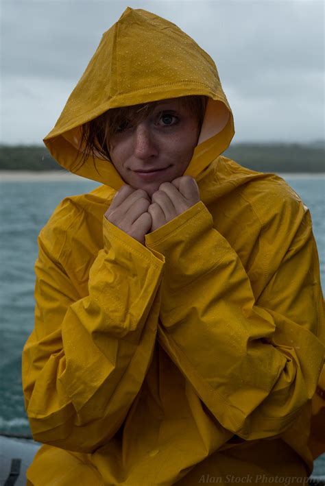 Alanstockphotography Portrait Girl Wet Raincoat Boat Sea Huddled Cold