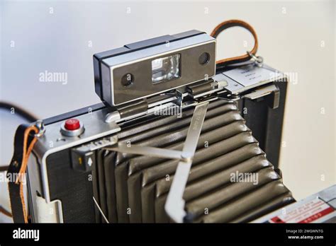 Vintage Folding Camera Close Up With Red Shutter Button Stock Photo Alamy
