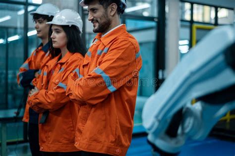 portrait of robotics engineers working with programming and