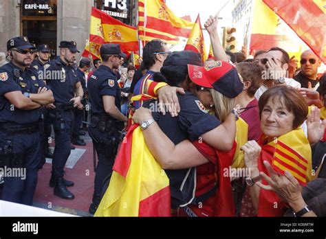 Demonstrators Holding Mostly Spanish Flags March To Protest The Catalan