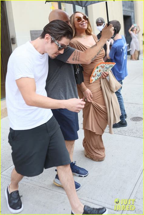 Mariah Carey Carries Butterfly Print Hand Fan During Nyc Outing With