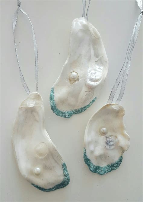Oyster Shells Dipped In Aqua Glitter And I Added A Pearl Via Carons
