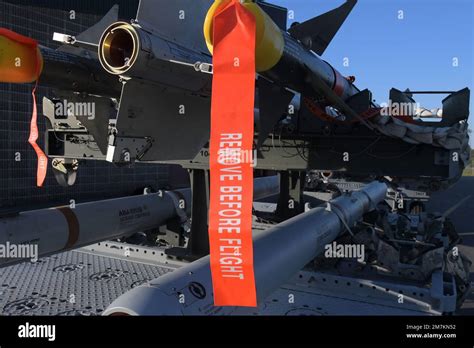 A Remove Before Flight Tag Hangs From An AIM 9M Sidewinder Missile At