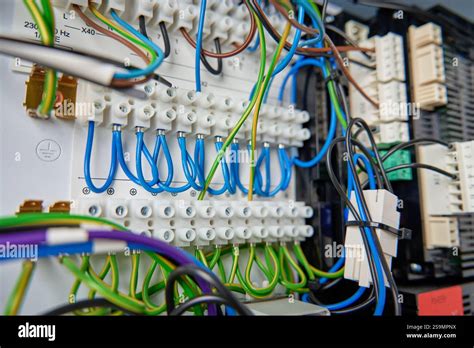 Colorful Wires And Components Connected To Terminal Block In Distribution Box Electrical