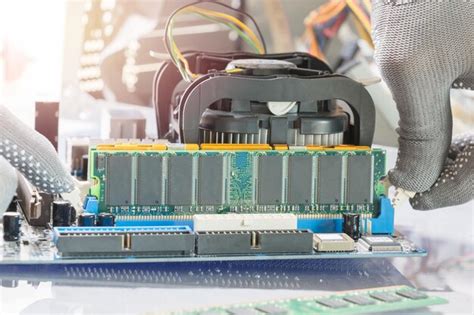 Premium Photo Cropped Image Of Hand Holding Circuit Board