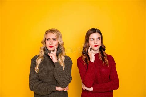 Two Minded Ladies Look Empty Space Holding Hand On Cheek Wear Knitted