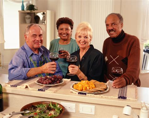 Mature Couples In Kitchen Smiling Portrait Free Photo Download