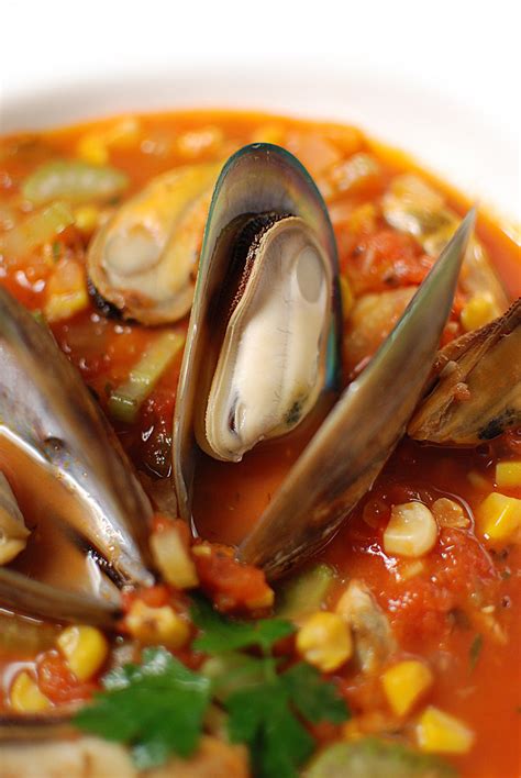 Mussel And Corn Chowder In Tomato Broth
