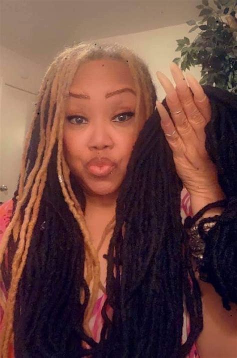 Holding Her Locs Icarusnewport