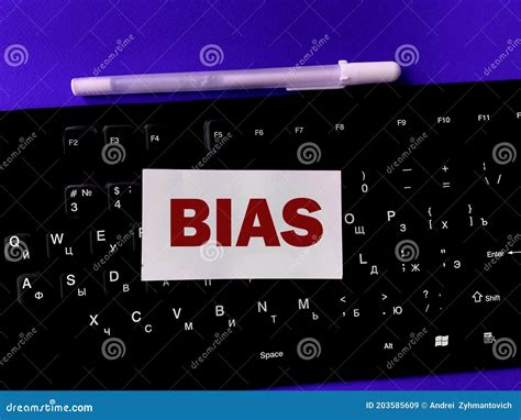 The Word Bias Is Written On A White Piece Of Paper That Is On The Keyboard Editorial Stock