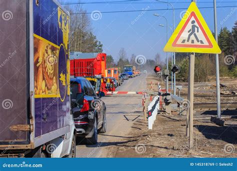 Closed Railway Crossing Train Rides Cars Waiting For The Opening Of