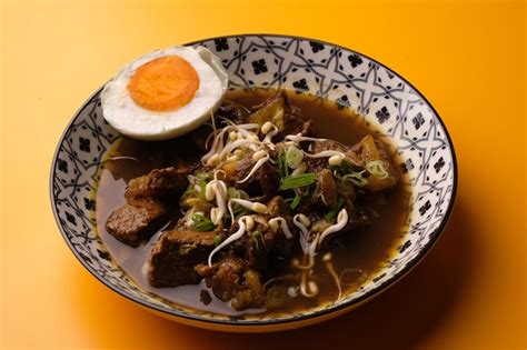 Premium Photo Rawon Is An Indonesian Beef Soup Originating From East