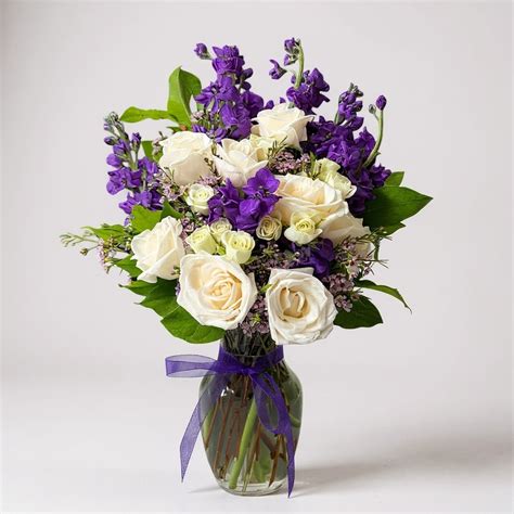 White Roses And Purple Stock Arrangement Midnight Garden Quinnflorist