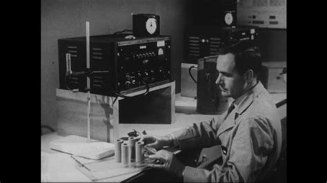 United States S S A Scientist Experiments With Sample Cylinders Using A Control Box