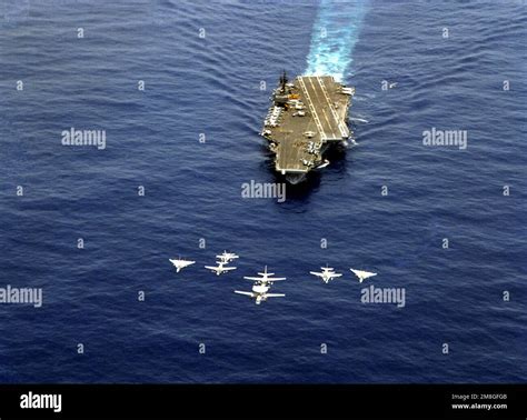 A Bow View Of The Aircraft Carrier Uss Kitty Hawk Cv 63 Underway With Various Aircraft Of