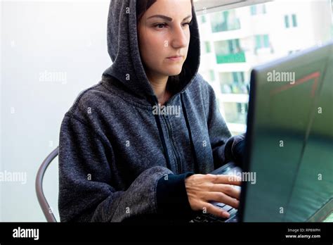 Woman Hacker Programmer Is Working On Computer In Cyber Security Center Filled With Display