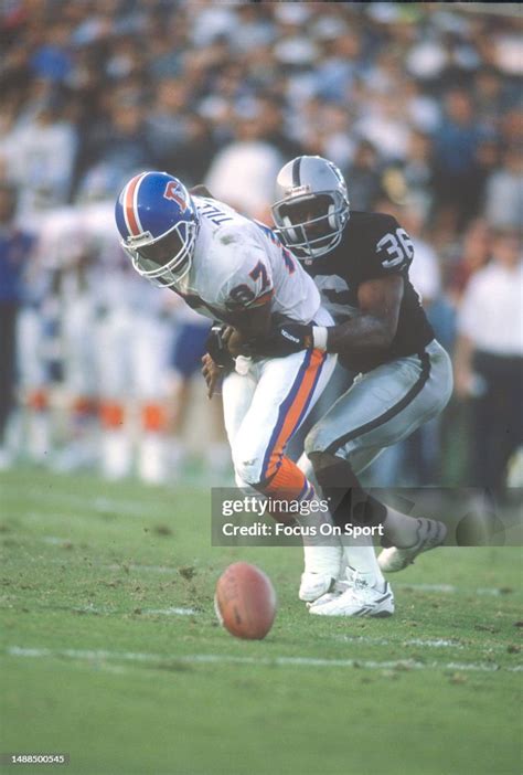 Terry Mcdaniel Of The Los Angeles Raiders Defends Cedric Tillman Of