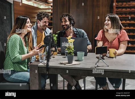 Young Friends Group Sharing Content Online On Streaming Platform With Webcam Millennial Guys