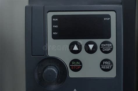 Control Panel Featuring Buttons For Operation And Adjustments In A