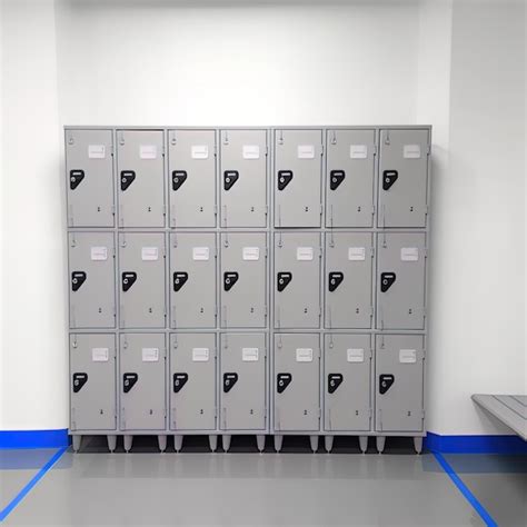 Premium Photo Lockers In A Room With A Blue Stripe On The Wall