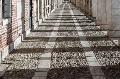 Premium Photo Architectural Detail Alternating Columns Creating Light And Shadow Effect
