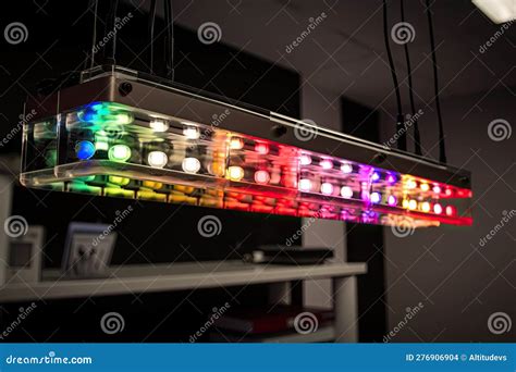 Hanging Sensor With Led Lights Array Showing The State Of Each Device