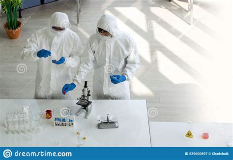 Epidemiological Researcher In Virus Protective Cloth Working In Laboratory Omicron Strain