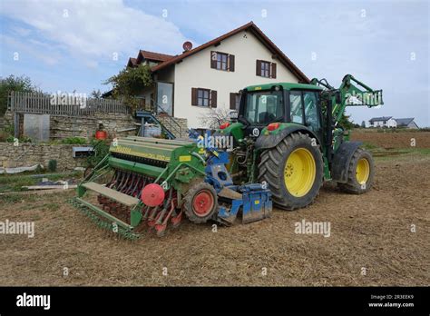 Tractor With Sawer Stock Photo Alamy