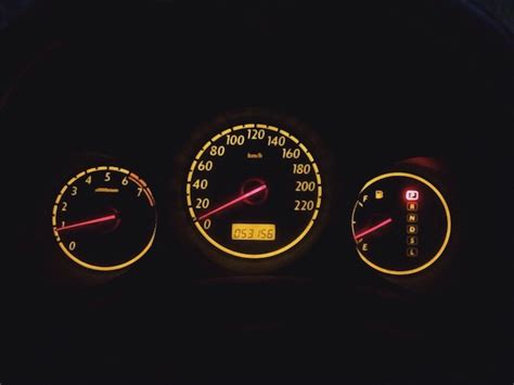 Premium Photo Illuminated Speedometer And Fuel Gauge In Car