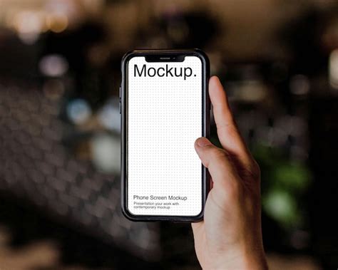 Premium Psd Mobile Phone Mockup On Hand