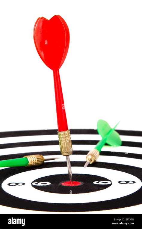 Red And Green Arrows On Dart Board Isolated On White Background Stock Photo Alamy